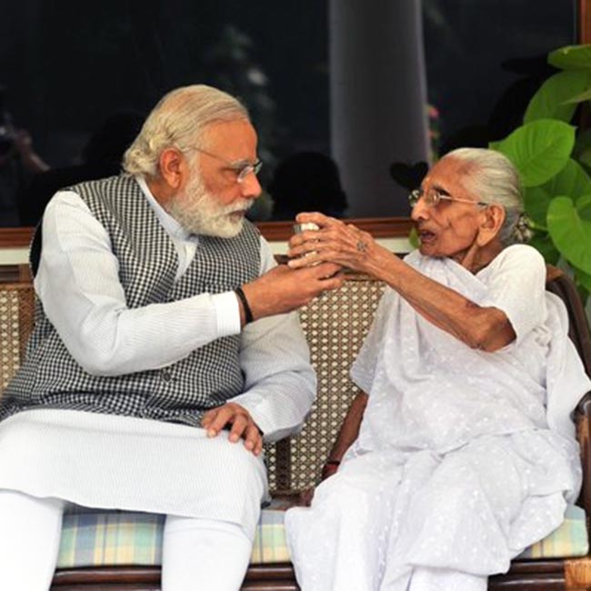 Narendra Modi with his mother at his official residence