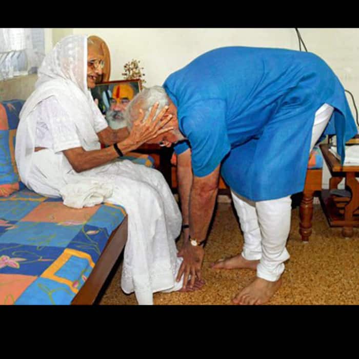 Narendra Modi touching mother’s feet