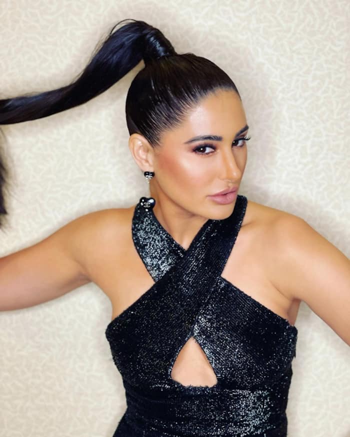 Nargis Fakhri Flaunts Plunging Neckline in Sexy Black