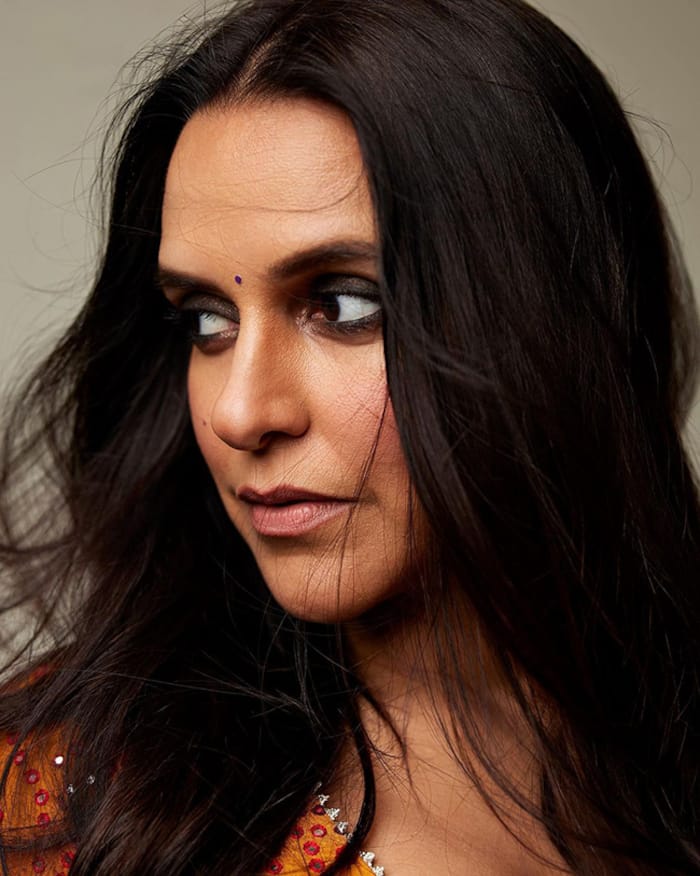 Neha Dhupia does the magic with her kohled eyes and that tiny black bindi