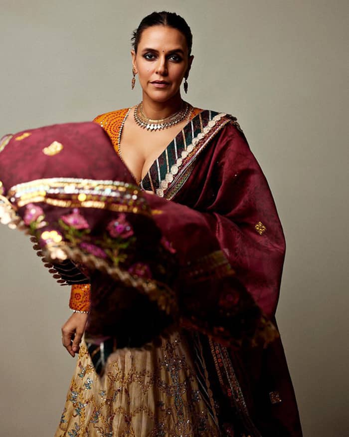 Neha Dhupia does the magic with her kohled eyes and that tiny black bindi