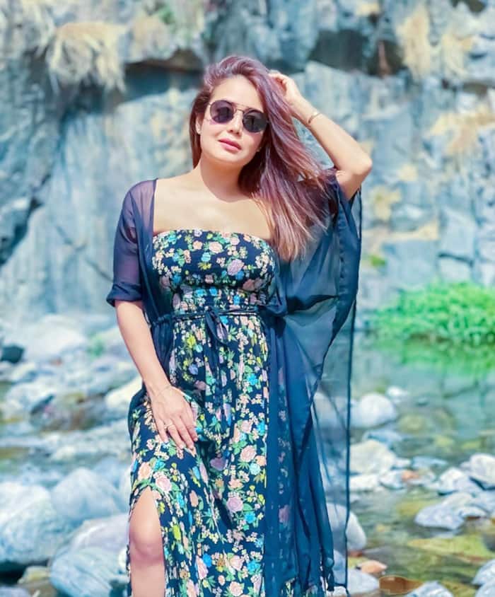 Neha Kakkar in Off-Shoulder Floral Dress With Thigh-High Slit is ...