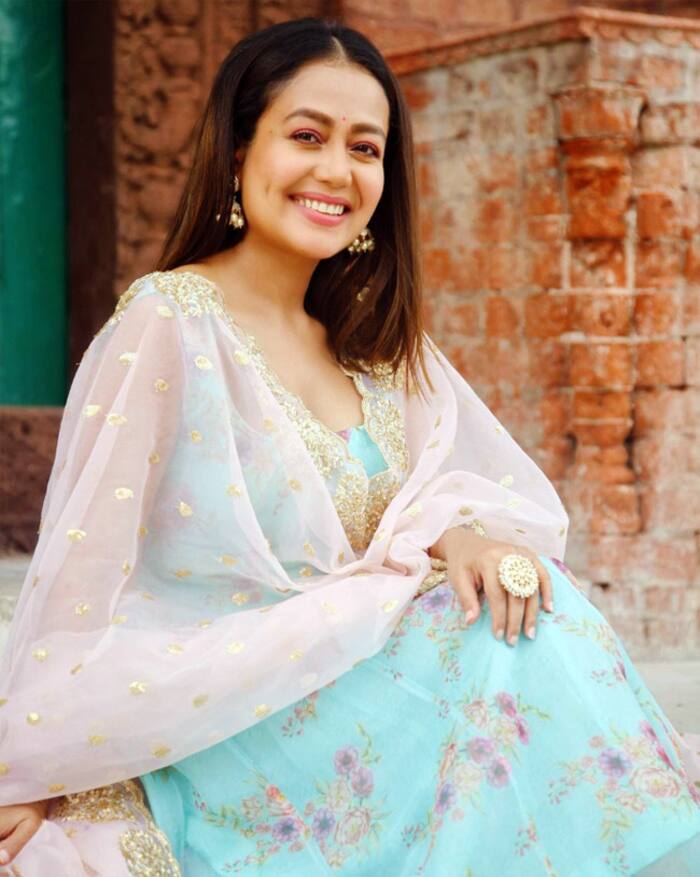 Neha Kakkar looks vibrant in a teal colour lehenga