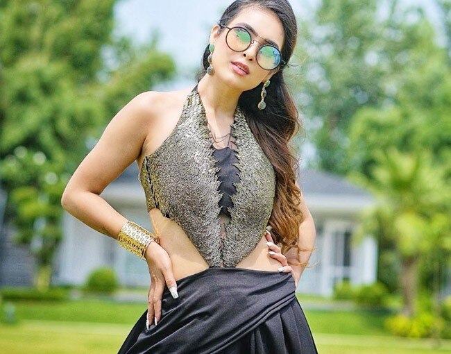 Neha Malik Flaunts Her Perfect Curves in Black Golden Ensemble