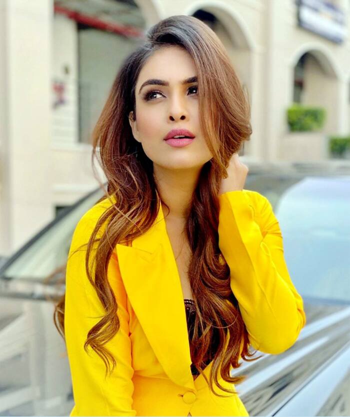 Neha Malik’s Sizzling BTS Pictures in Off Shoulder Gown From Sets of ...