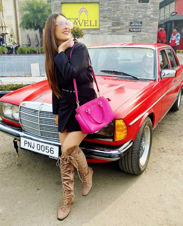 Neha Malik Poses With a Luxury Car