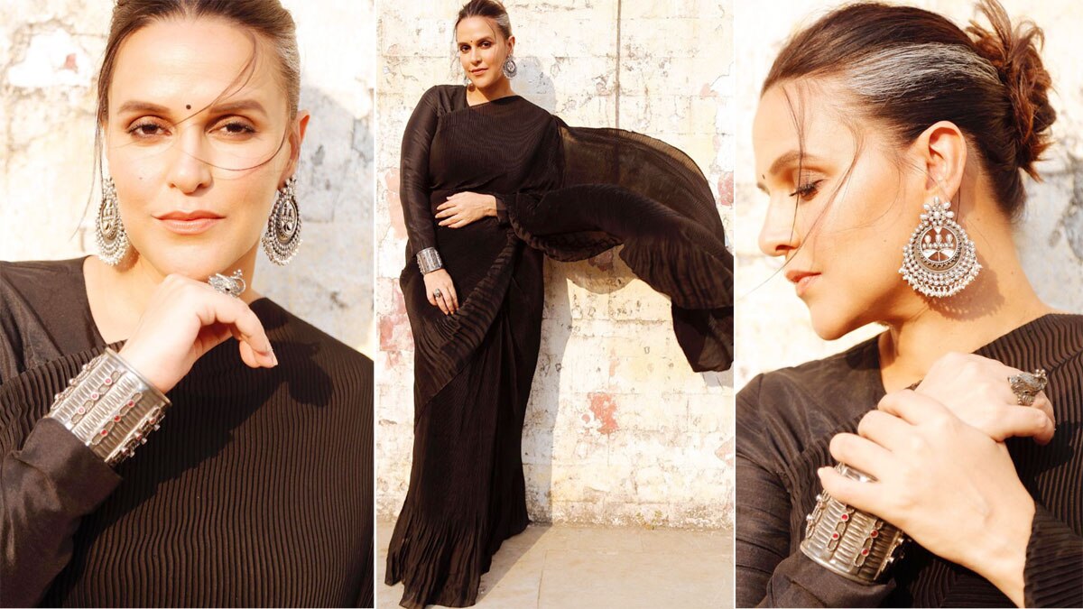 Neha Dhupia Flaunts Her Sartorial Side in Black Saree