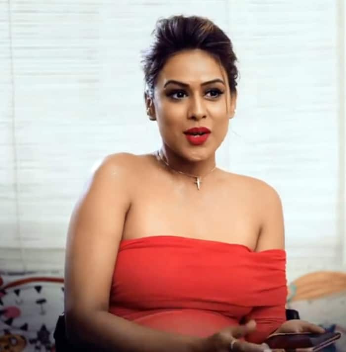 Nia Sharma looks fabulous in a seductive red dress
