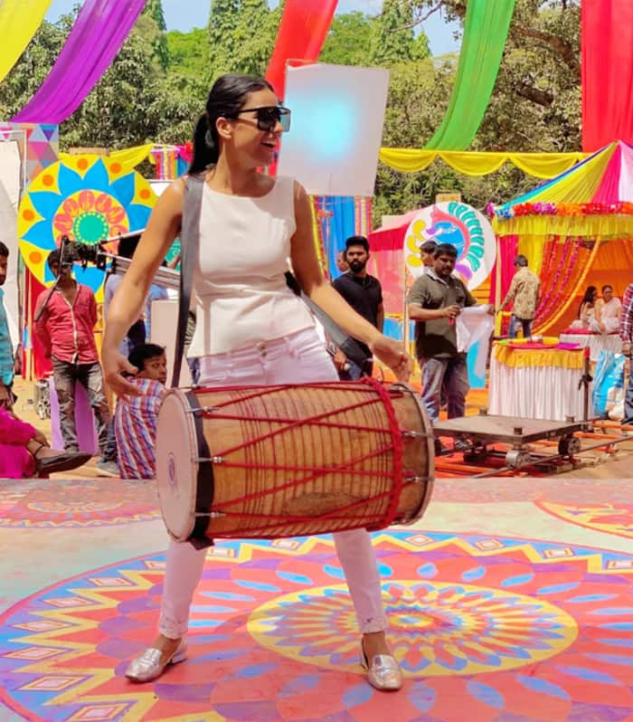 Nia Sharma playing the Dhol