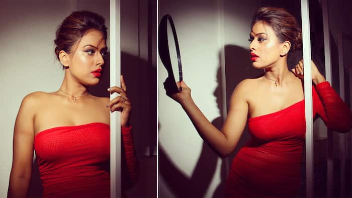 Nia Sharma looks fabulous in a seductive red dress
