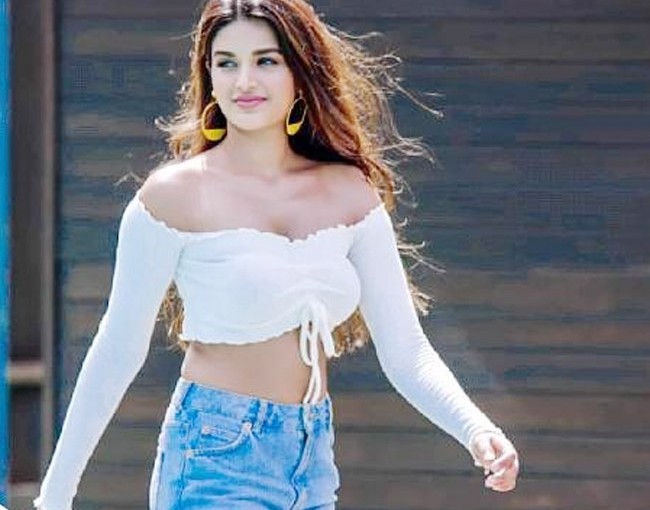 Nidhhi Agerwal Stuns In Crop Top And Denim Skirt