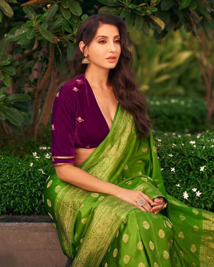 Nora Fatehi is a Beauty to Behold in Stunning Green Saree With Plunging ...