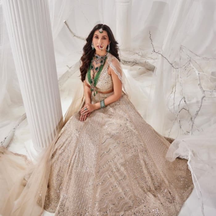 Nora Fatehi in an Ivory-Beige Mirror Work Lehenga Truly Sets Ethnic ...