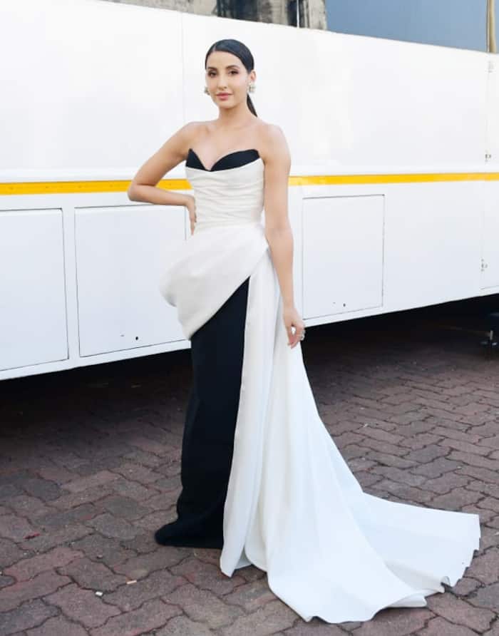 Nora Fatehi Looks Holy Divine in Sexy Black And White Gown With Floor ...