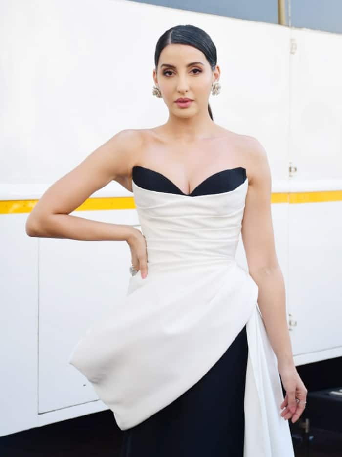 Nora Fatehi Looks Holy Divine in Sexy Black And White Gown With Floor ...