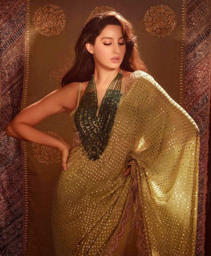 Nora Fatehi is a Banjari in Gorgeous Red Lehenga