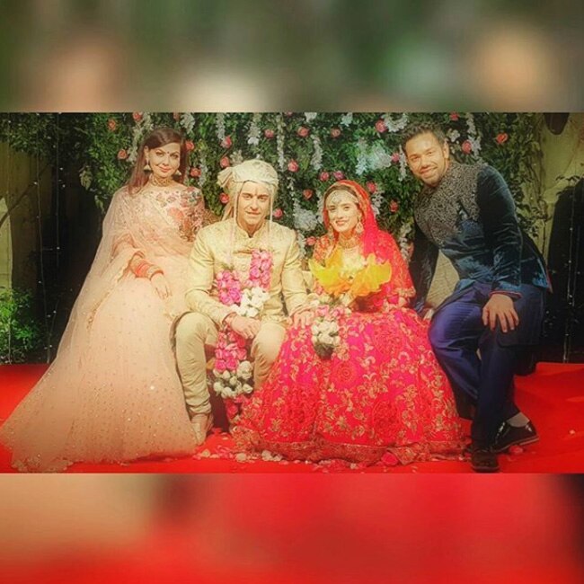 Pankhuri Rode with husband Gautam Rode with wedding guests