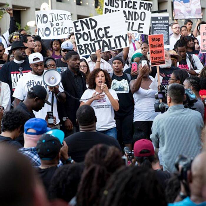 Protestors and police officers clicked at Dallas