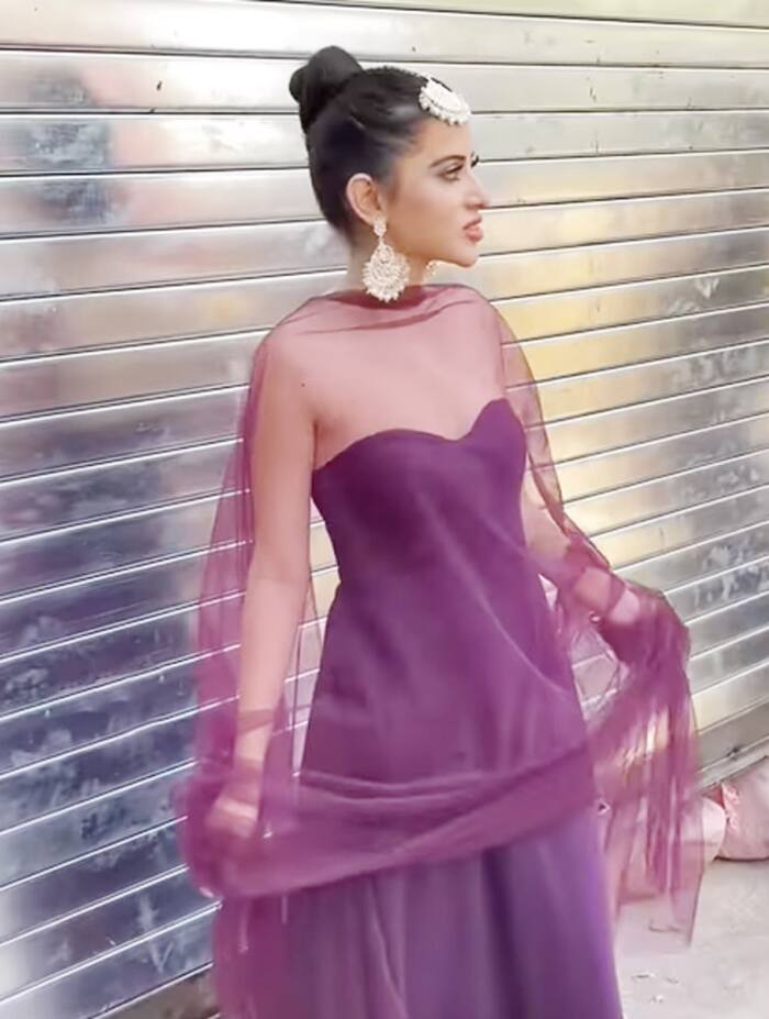 Urfi Javed looks pretty in a traditional purple suit