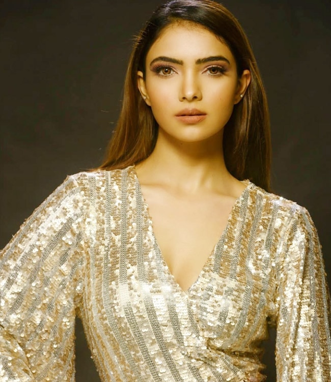 Pooja Banerjee Goes Sultry in Golden Sparkling Dress