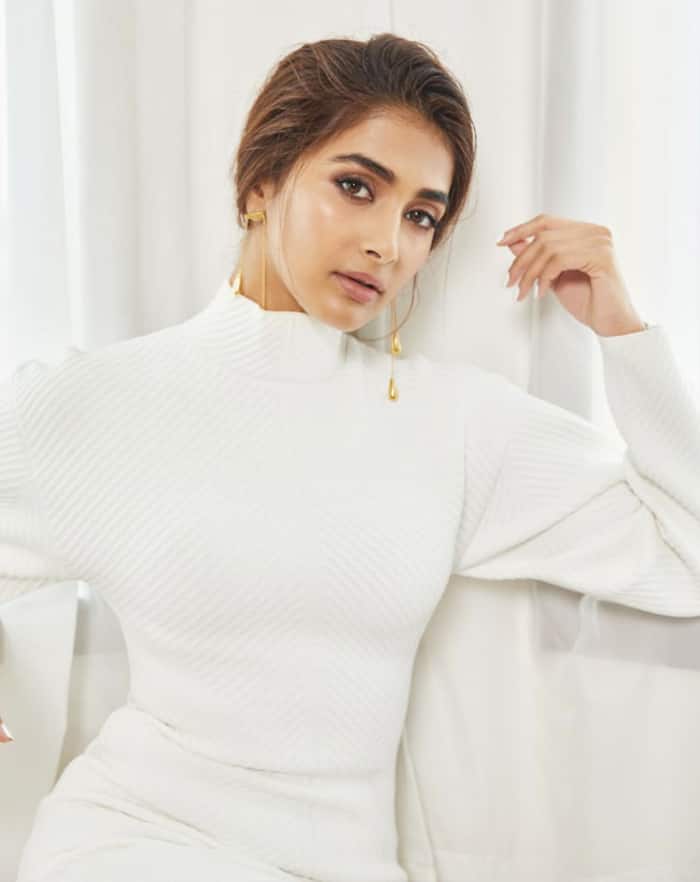 Pooja Hegde Looks Edgy And Bold in Her White Turtle Neck Bodycon Dress