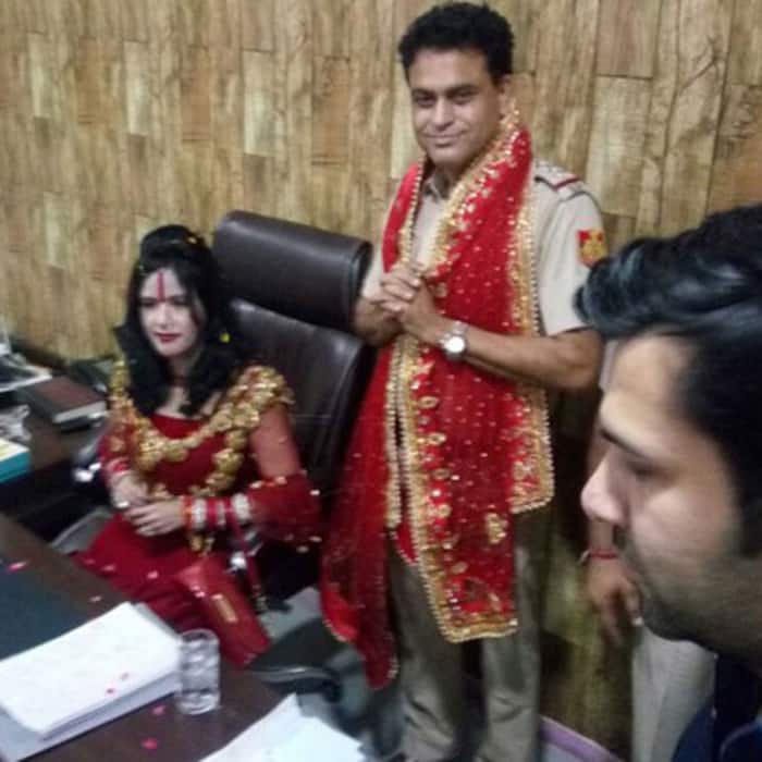 Radhe Maa in short red dress