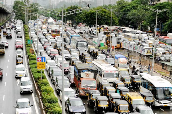 Mumbai Rains in Pics: Heavy Rainfall Causes Waterlogging, Traffic Jams ...