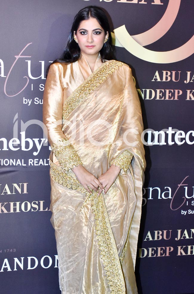 Rhea Kapoor turned heads in a beige and golden saree