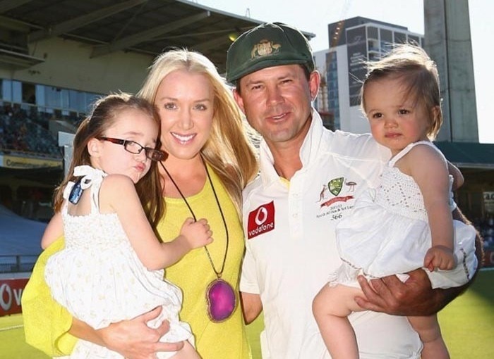 Ricky Ponting poses with wife Rianna Ponting and their daughters
