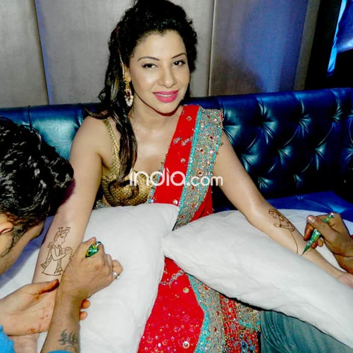 Sambhavna Seth poses on a tractor before her Mehendi ceremony