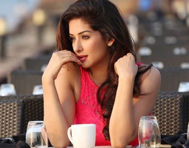 Sameksha Singh posing for an ad shoot