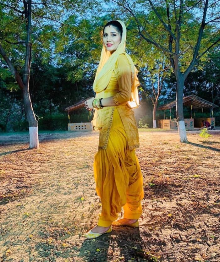 Sapna Choudhary poses with husband Veer