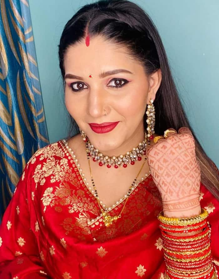 Sapna Choudhary poses with husband Veer