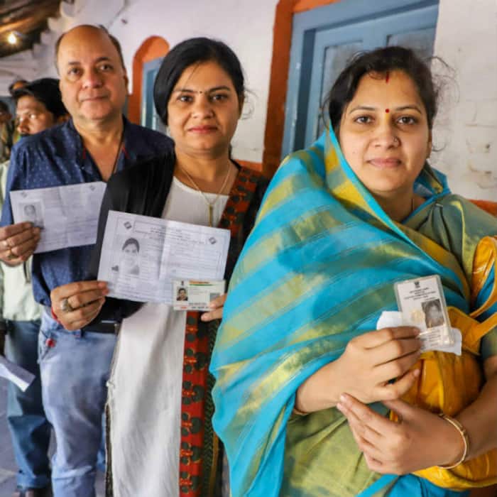 Eyes do all the talking. Young Muslim women jubliant after casting vote