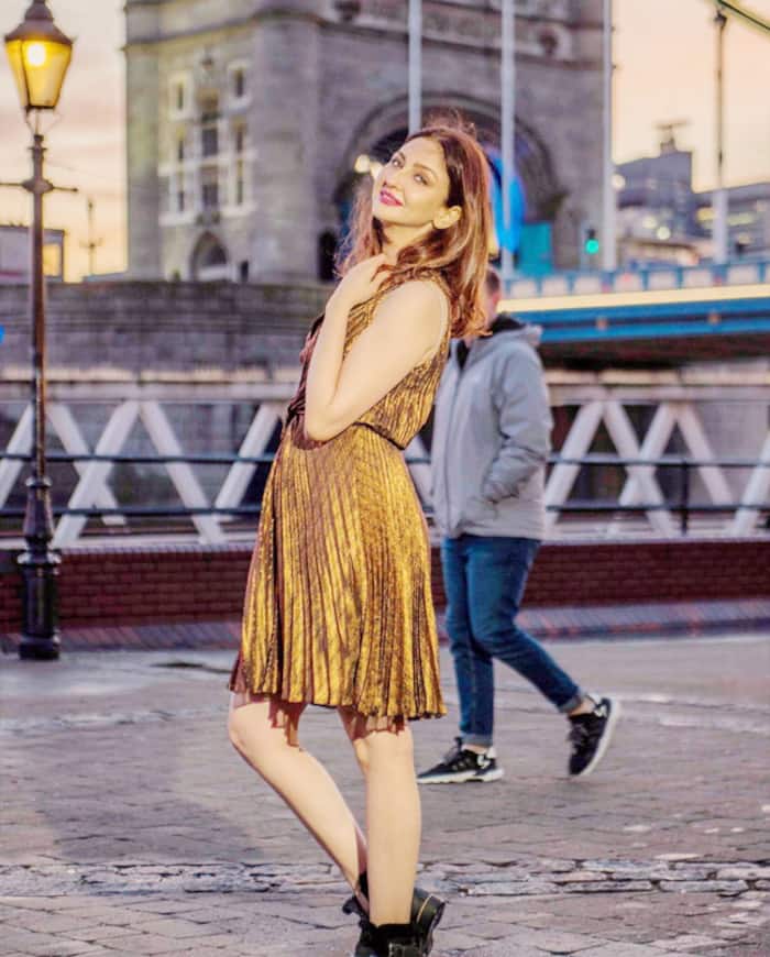 Saumya Tandon sun kissed picture in golden dress