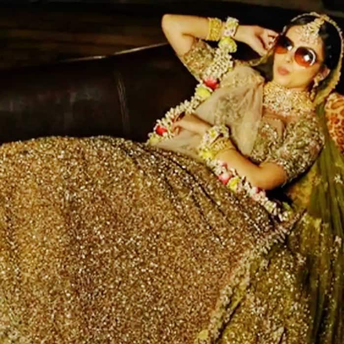 Shrenu Parikh flaunts her radiant smile as she is dressed as a bride