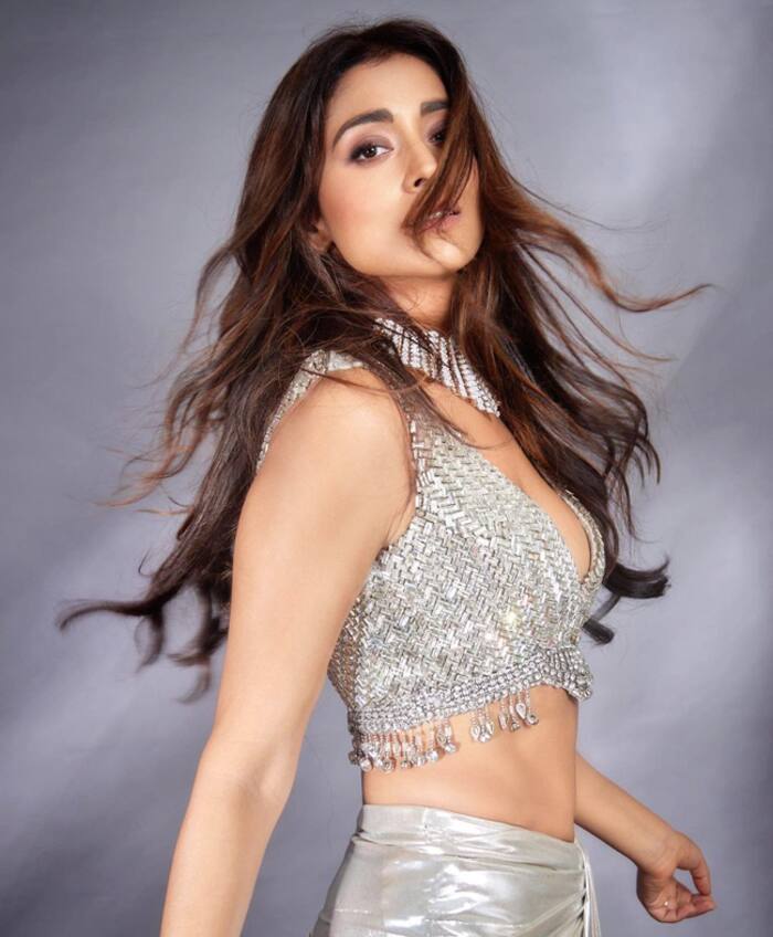 Shriya Saran Maximises Hotness in Silver Blouse And Side Pleated Skirt l PHOTOS
