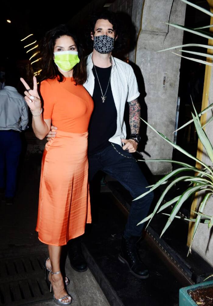 Sunny Leone Looks Ravishing in Orange as She Poses With Husband Daniel ...