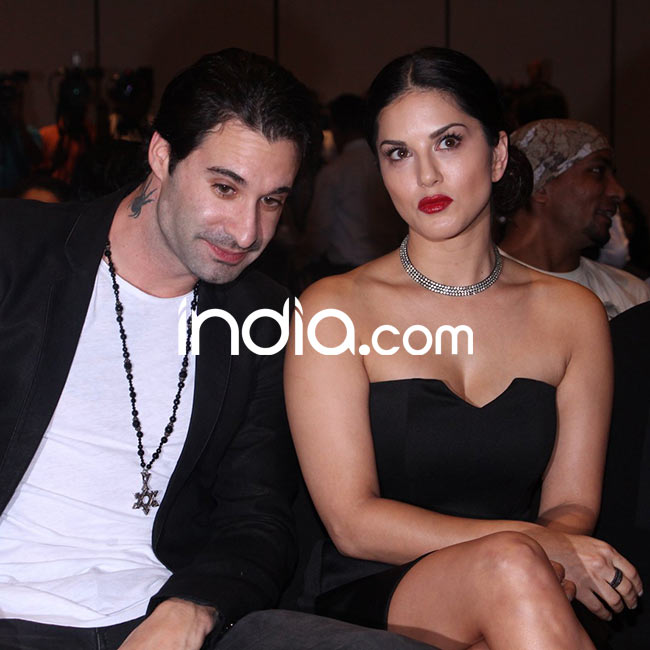 Daniel Weber holding wife Sunny Leone’s hand
