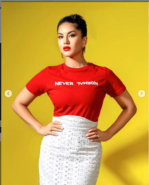 Sunny Leone Looks Hot in Red Top White Skirt For The Trailer Launch of ...