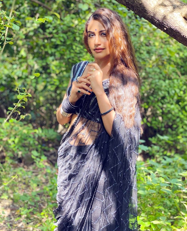 Surbhi Chandna Tuens Up The Heat in Sheer Blue Saree