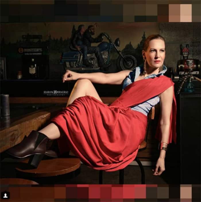 Suzanne Bernert strikes pose during a photoshoot