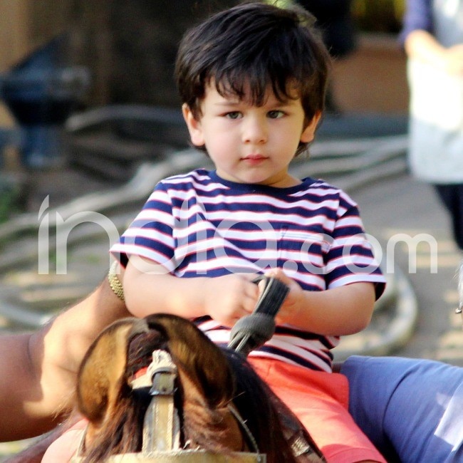 Taimur cutely sticks his tongue out