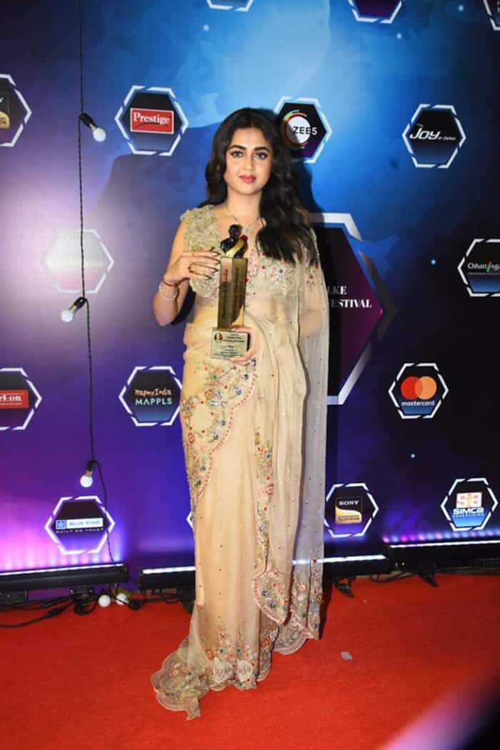 Tejasswi Prakash looked breathtaking in a golden-coloured sheer saree ...