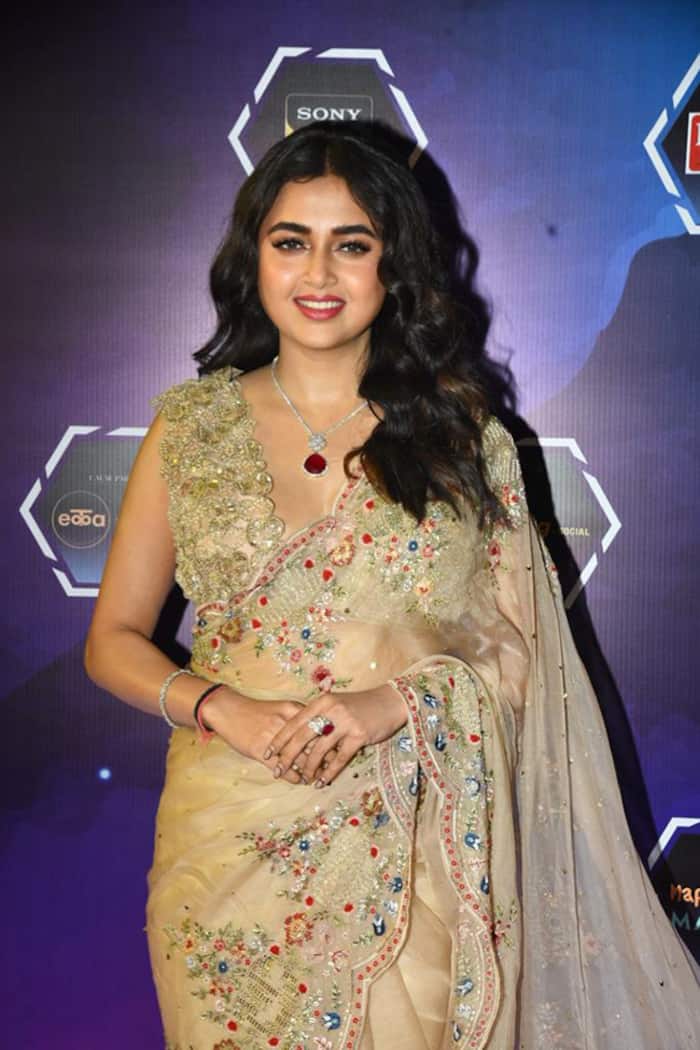 Tejasswi Prakash looked breathtaking in a golden-coloured sheer saree ...