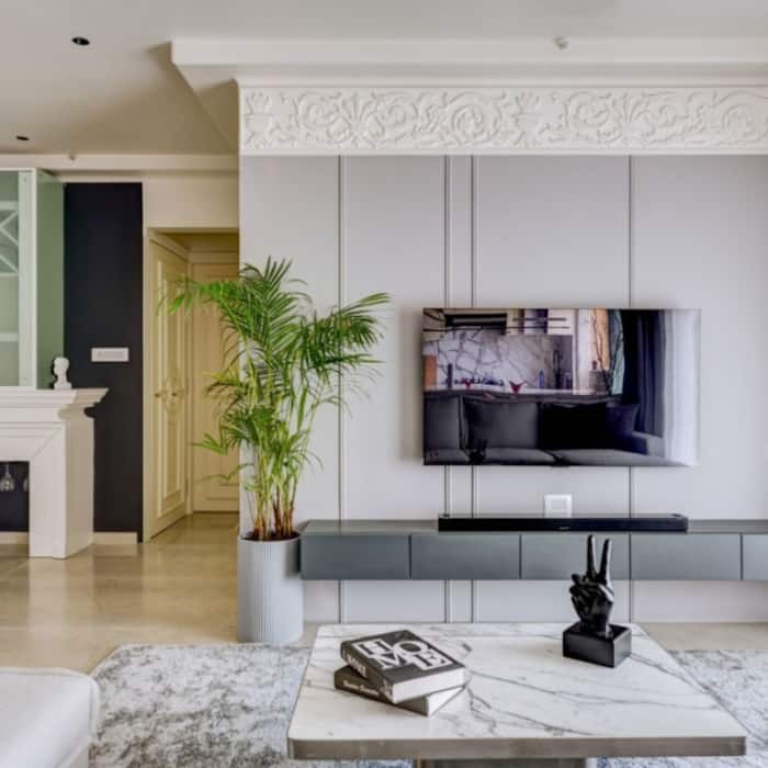 The wall with the TV in Yashasvi Jaiswal's home is painted in a soft ...