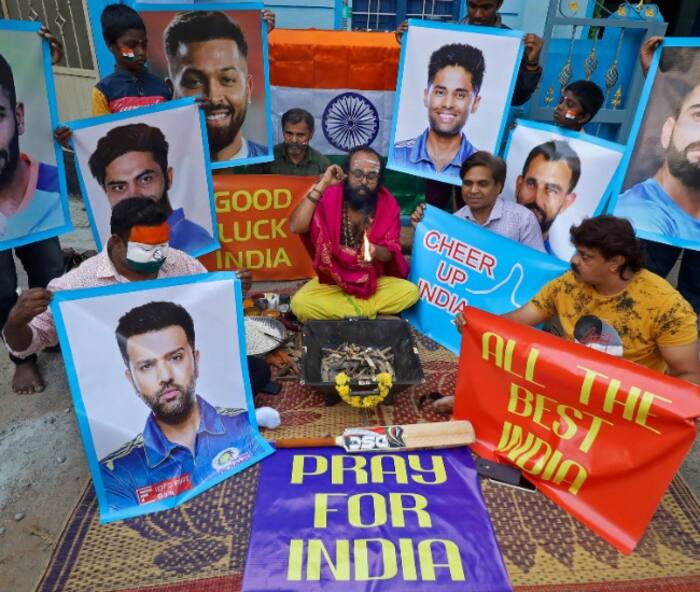 This photo from South India shows fans performing puja before India's match against Pakistan in ...
