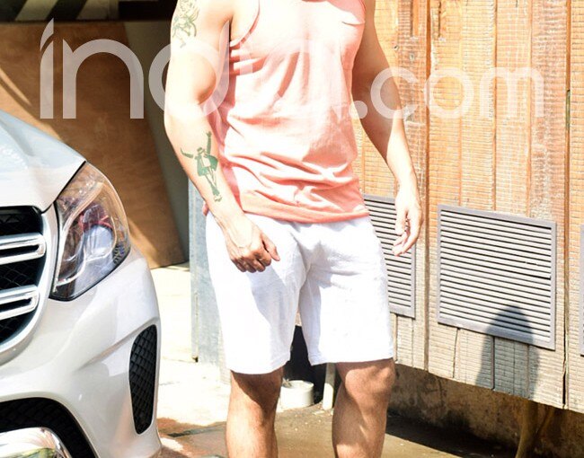 Varun Dhawan in Orange Tee And Short