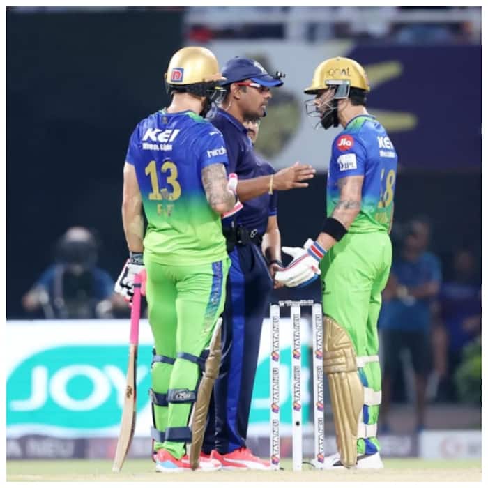 Virat Kohli (R) argues with the umpire about his dismissal against KKR in IPL 2024.