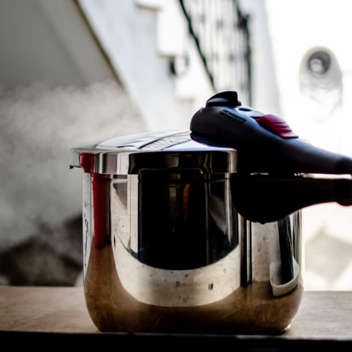 Pressure cooker vs Open lid cooking: Which cooking technique saves LPG?
